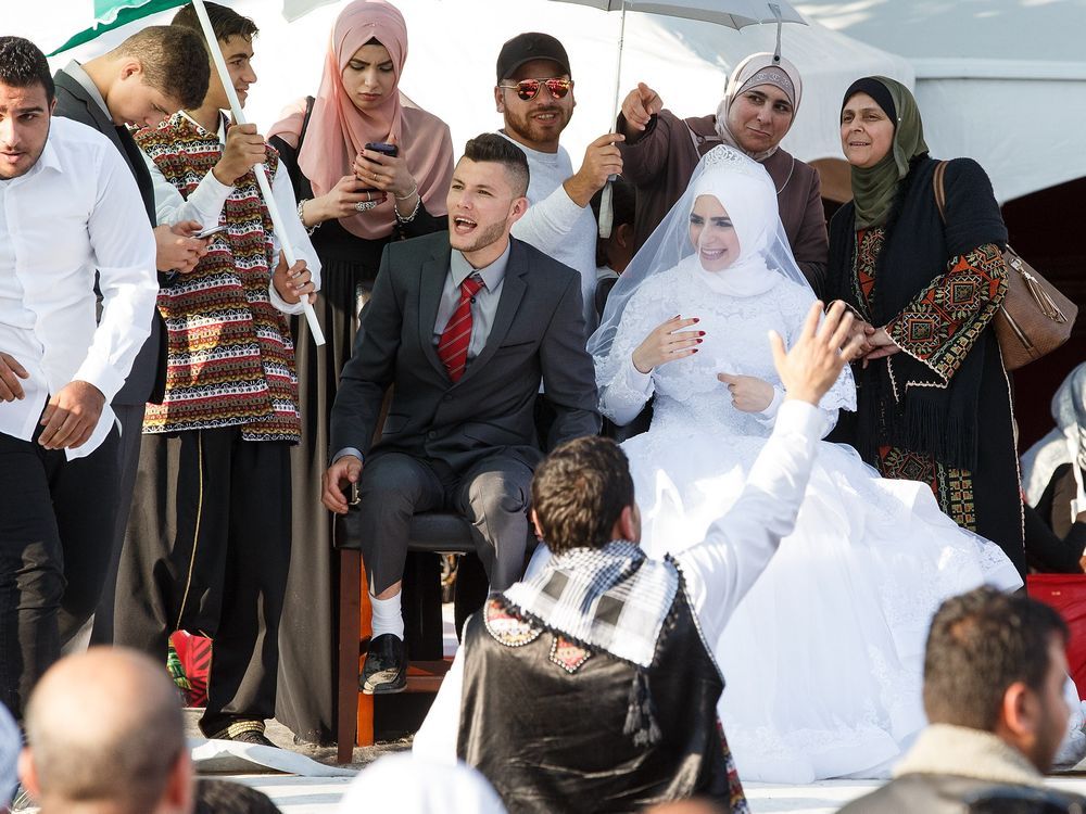 Wild weather, new Canadians, Syrian wedding on Day 1 of Heritage Fest ...