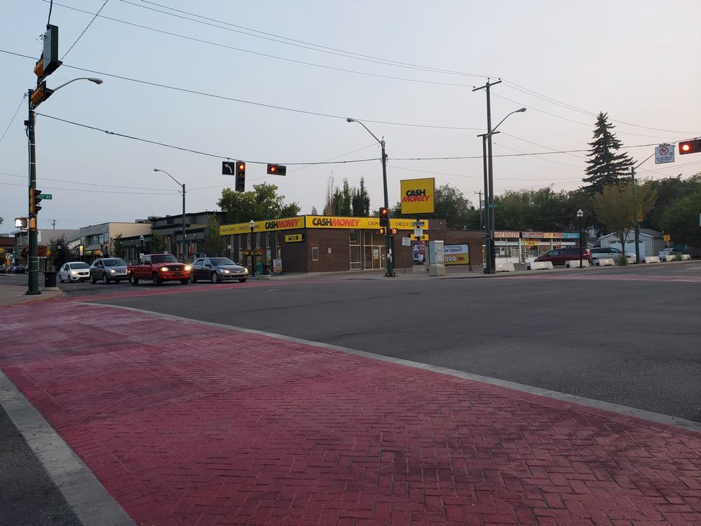 Red crosswalks painted along 124 Street for beauty, safety | Edmonton ...