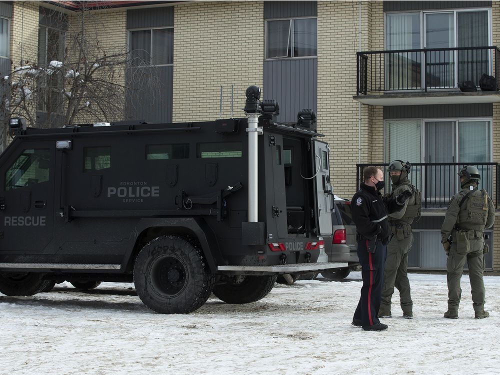 Police armoured vehicle, officers descend on central Edmonton apartment ...