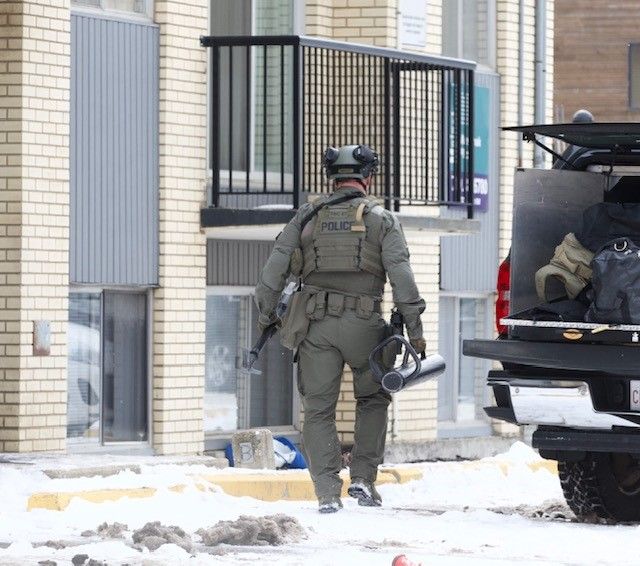 Police armoured vehicle, officers descend on central Edmonton apartment ...