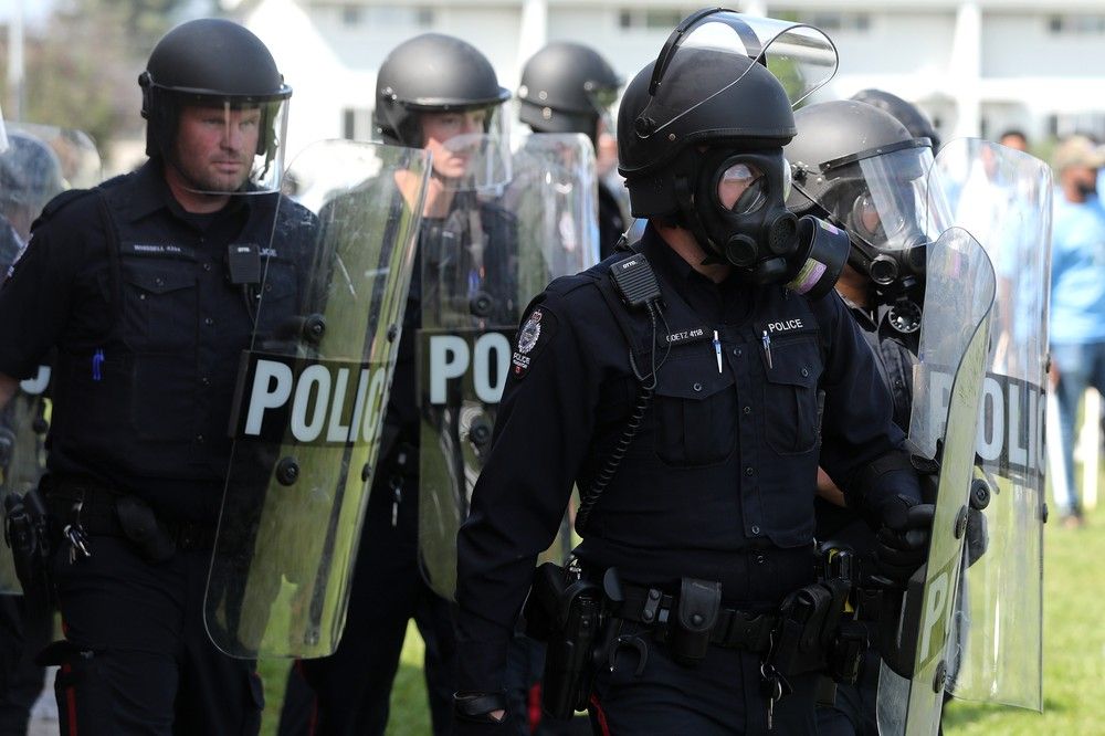 Photos: Pro- and anti-Eritrean government crowds clash in Edmonton ...