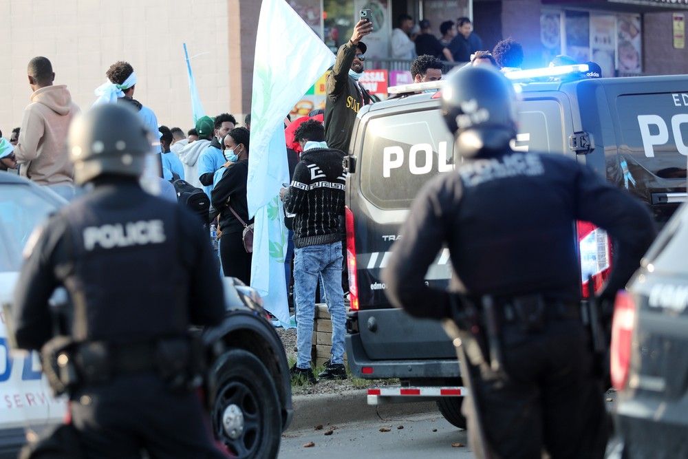 Photos: Pro- and anti-Eritrean government crowds clash in Edmonton ...