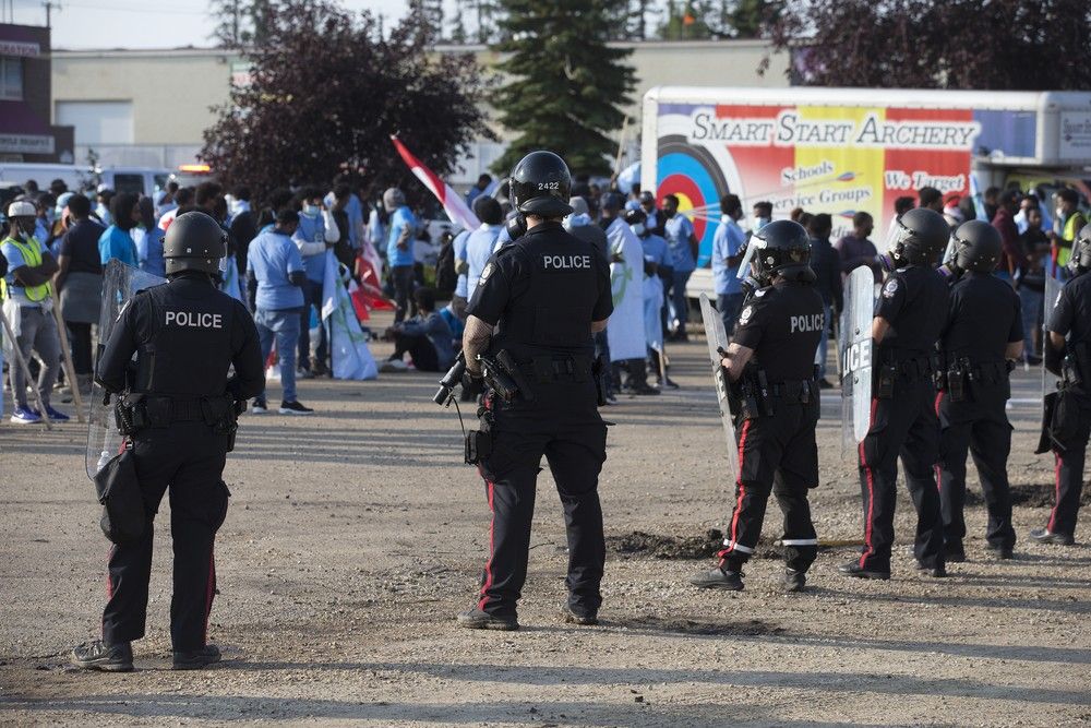 Photos: Pro- and anti-Eritrean government crowds clash in Edmonton ...