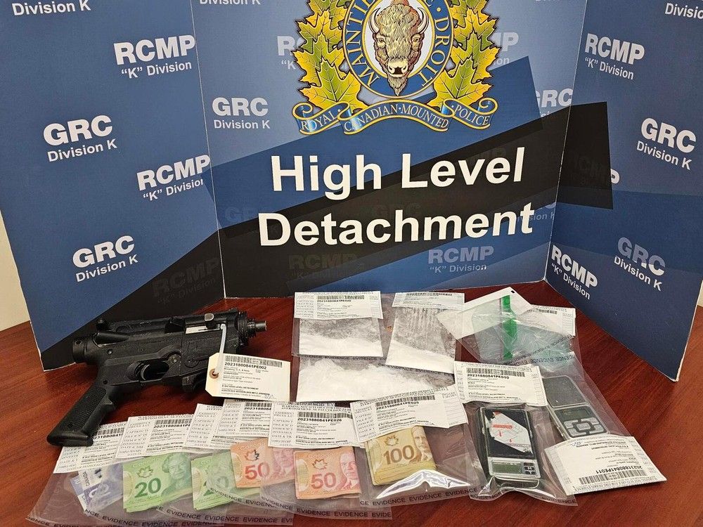 Two charged after High Level RCMP seize gun, cocaine and cash ...