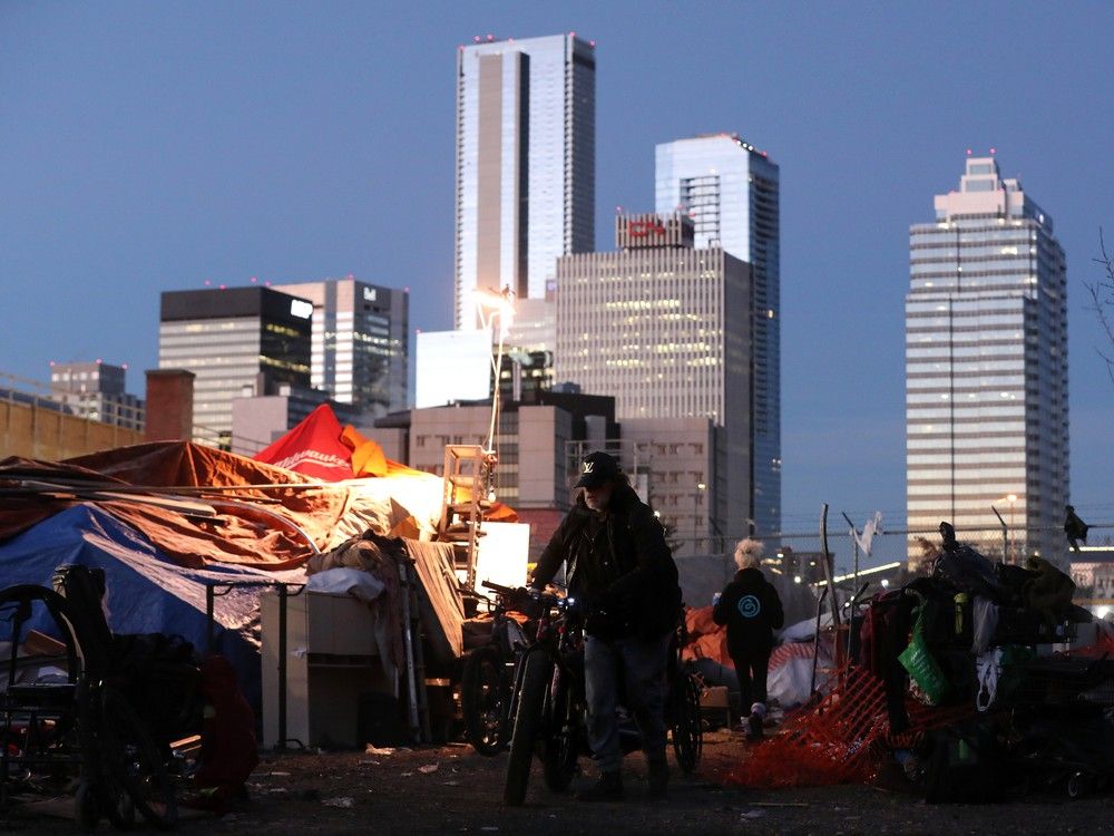 Photos: City of Edmonton, EPS crews clear homeless encampment ...