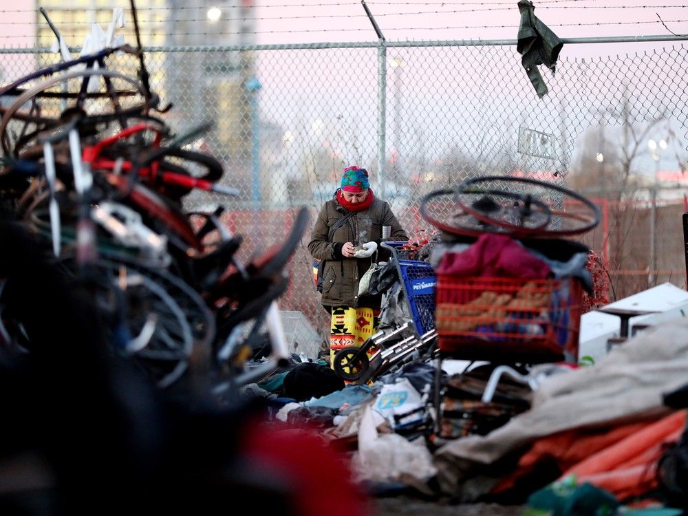 Photos: City of Edmonton, EPS crews clear homeless encampment ...