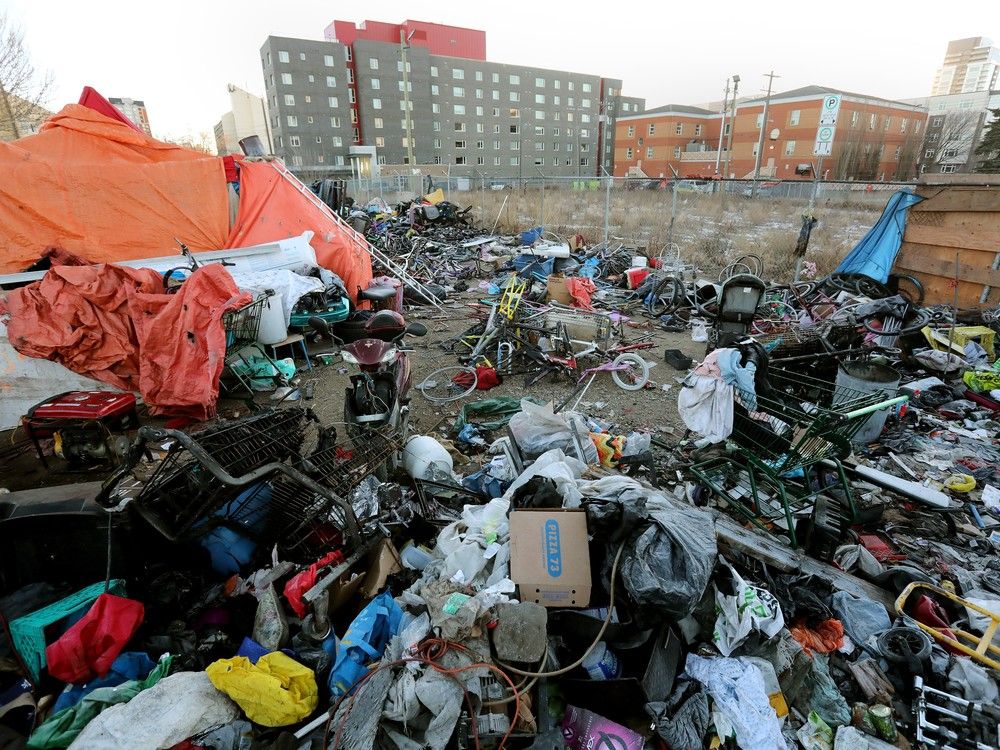 Photos: City of Edmonton, EPS crews clear homeless encampment ...