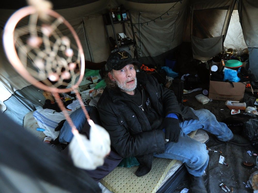 Photos: City of Edmonton, EPS crews clear homeless encampment ...