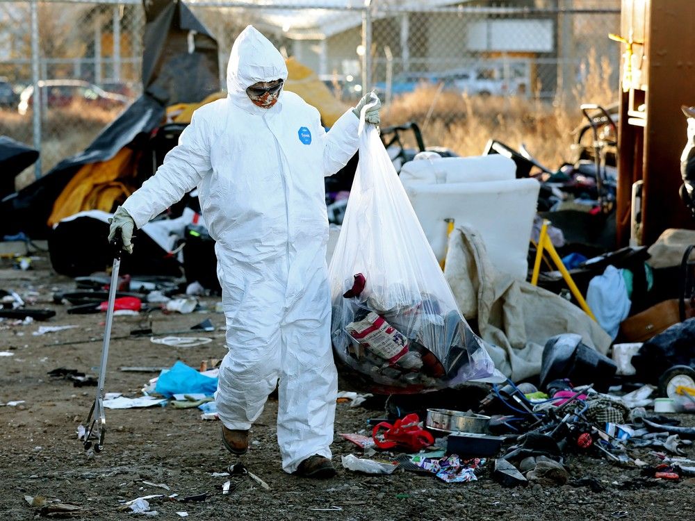 Photos: City of Edmonton, EPS crews clear homeless encampment ...