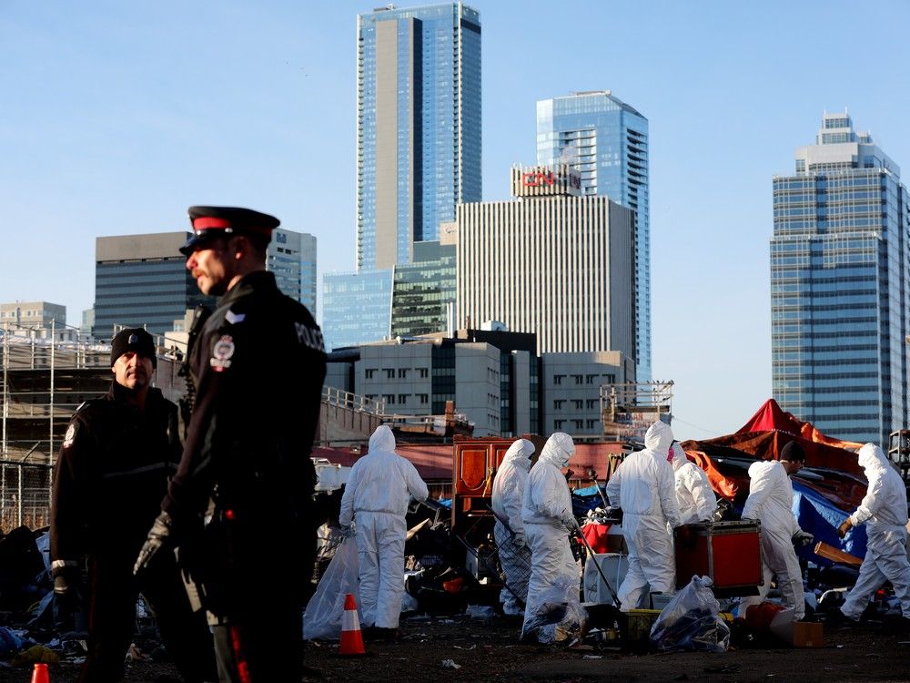 Photos: City of Edmonton, EPS crews clear homeless encampment ...