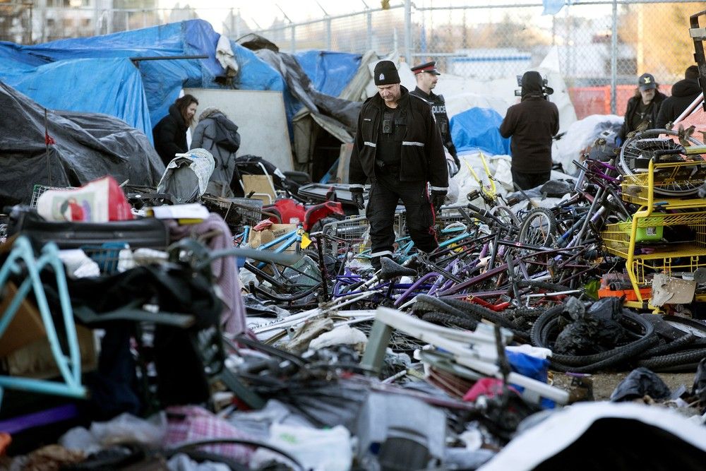 Photos: City of Edmonton, EPS crews clear homeless encampment ...