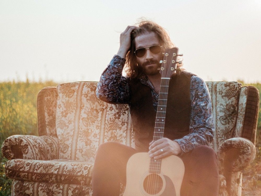 Local singer-songwriter John Hewitt turns the page with new book ...