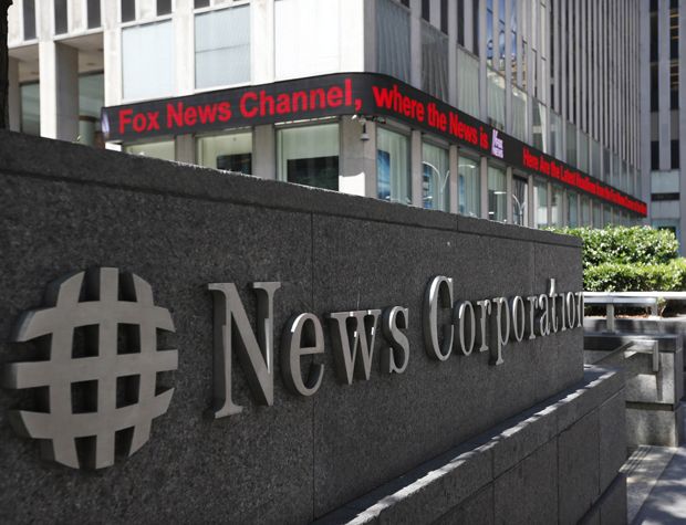 News Corp posts loss on restructuring charge | Financial Post