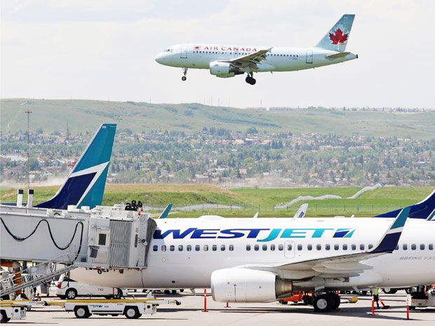 Air Canada, WestJet shares dive as worries grow that weak loonie could ...