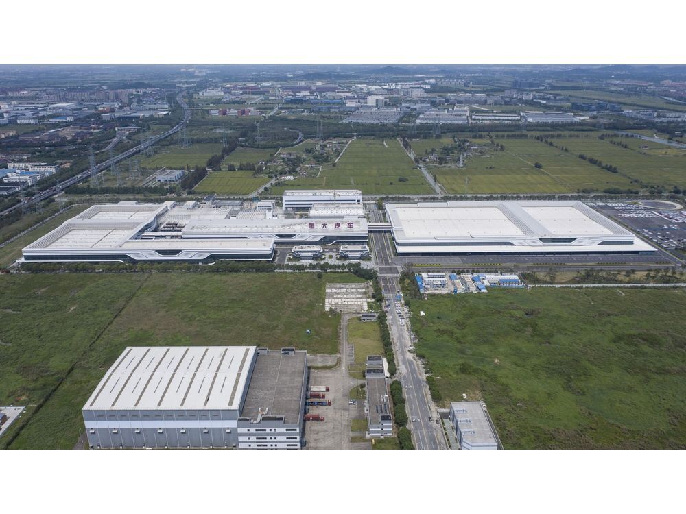 Evergrande EV Unit Fights for Survival After Vowing to Overtake Tesla ...