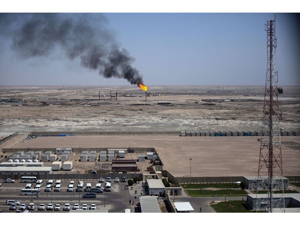 Exxon Signs Majnoon Oil Field Deal for Re-Entry Into Iraq | Financial Post