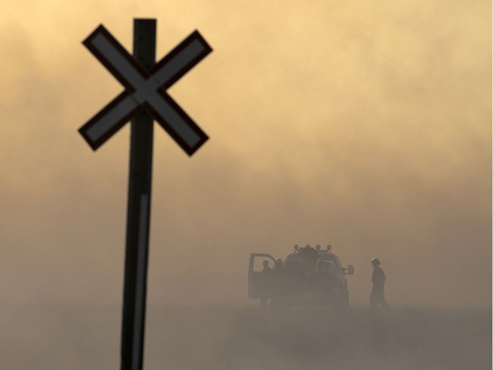 Gallery: Firefighters battle grass fire outside Regina Wednesday ...