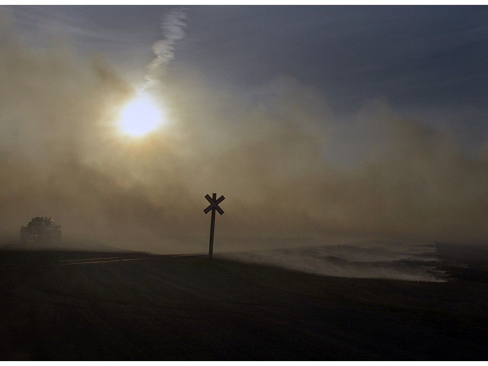 Gallery: Firefighters battle grass fire outside Regina Wednesday ...