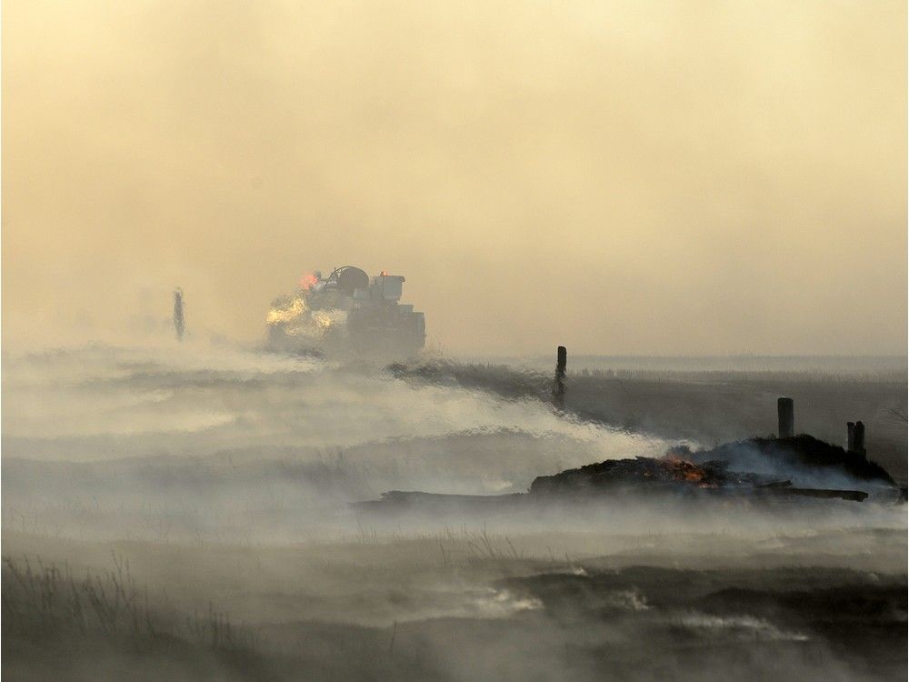 Gallery: Firefighters battle grass fire outside Regina Wednesday ...