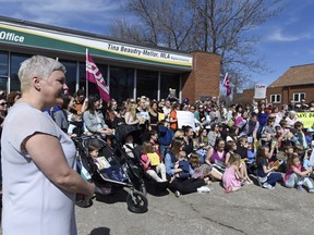 Hundreds in Sask. gather at MLA offices to protest library cuts ...