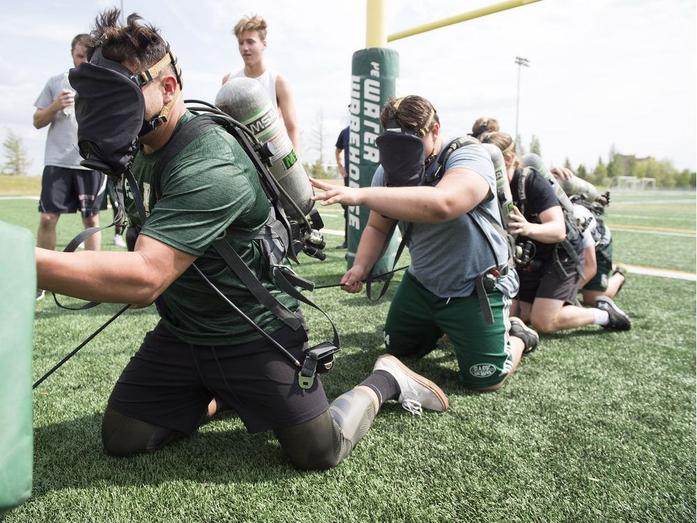 Gallery: Rams get a lesson in team building from Regina firefighters ...
