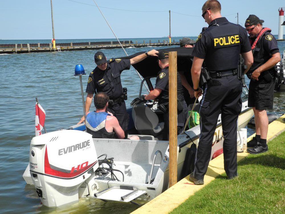 Police nab impaired boater, save sinking boat, at Pottahawk party ...