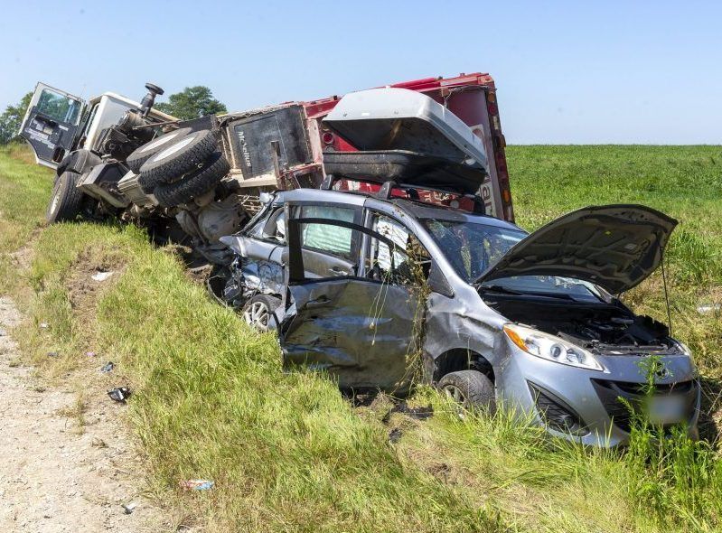 Garbage truck driver's actions 'saved five lives' in crash with minivan ...