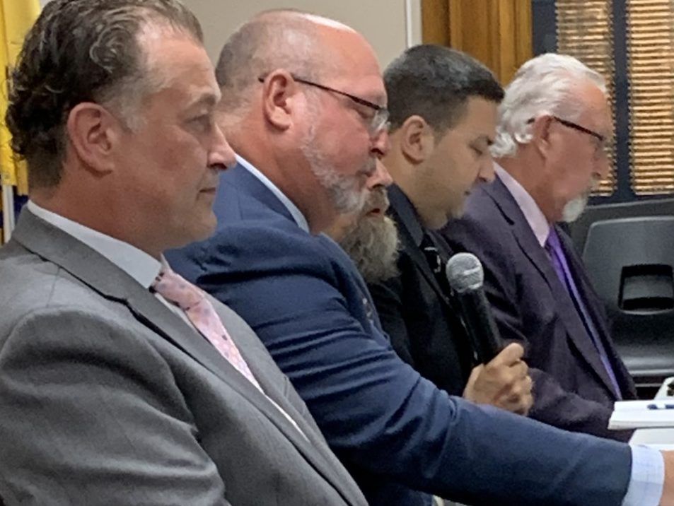 Embattled area mayor exits political shadows for candidates event ...