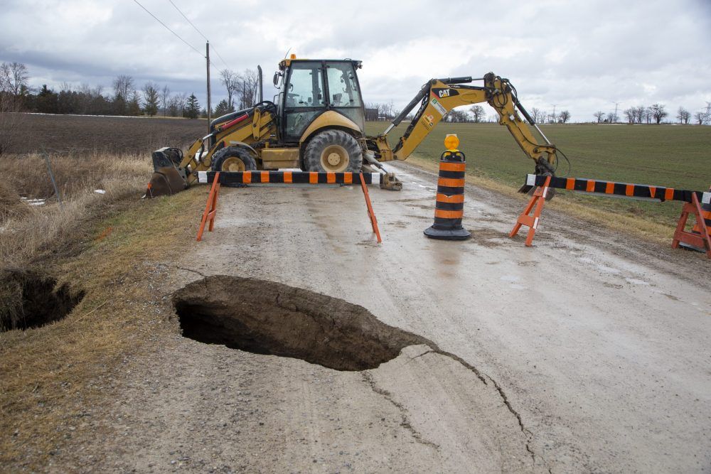 Sinkhole shuts area road: 'It would've swallowed up a vehicle' | London ...