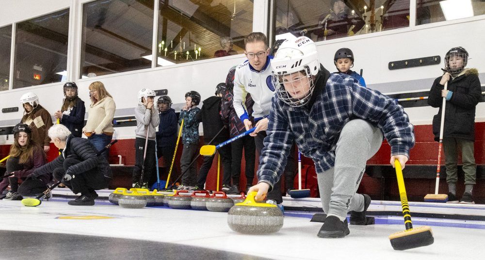 PHOTOS: Brier stars teach local schoolkids curling's finer points ...
