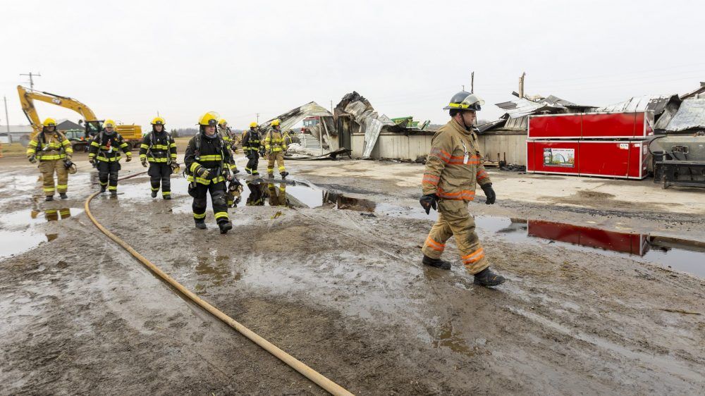 PHOTOS: Firefighters douse smouldering aftermath of $2M barn blaze ...