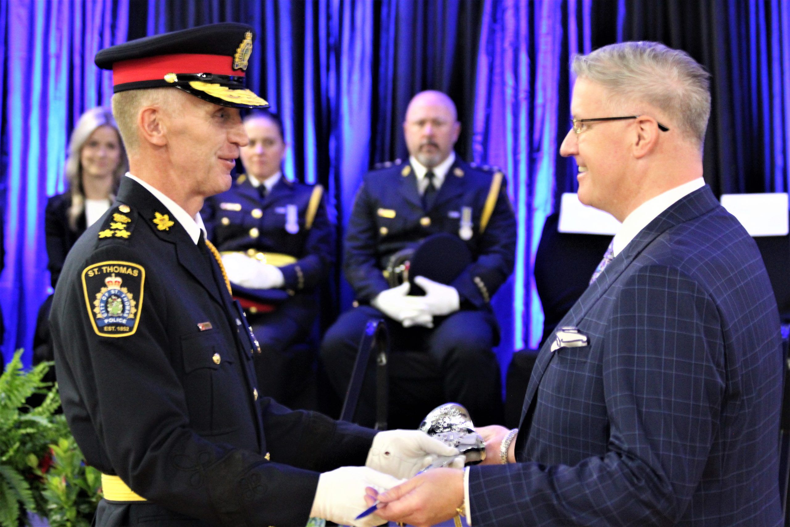 Passing of the torch: Retired police chief gives chief's badge to son ...