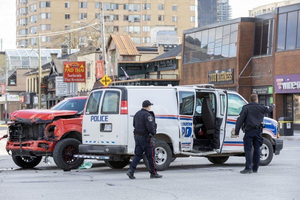 Officer hurt after pickup, London police van collide near downtown ...