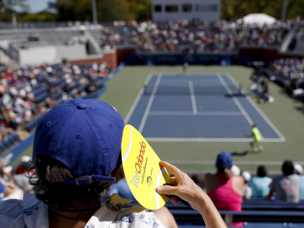 Tennis-ball shaped fans a must-have accessory in N.Y. heat at U.S Open ...