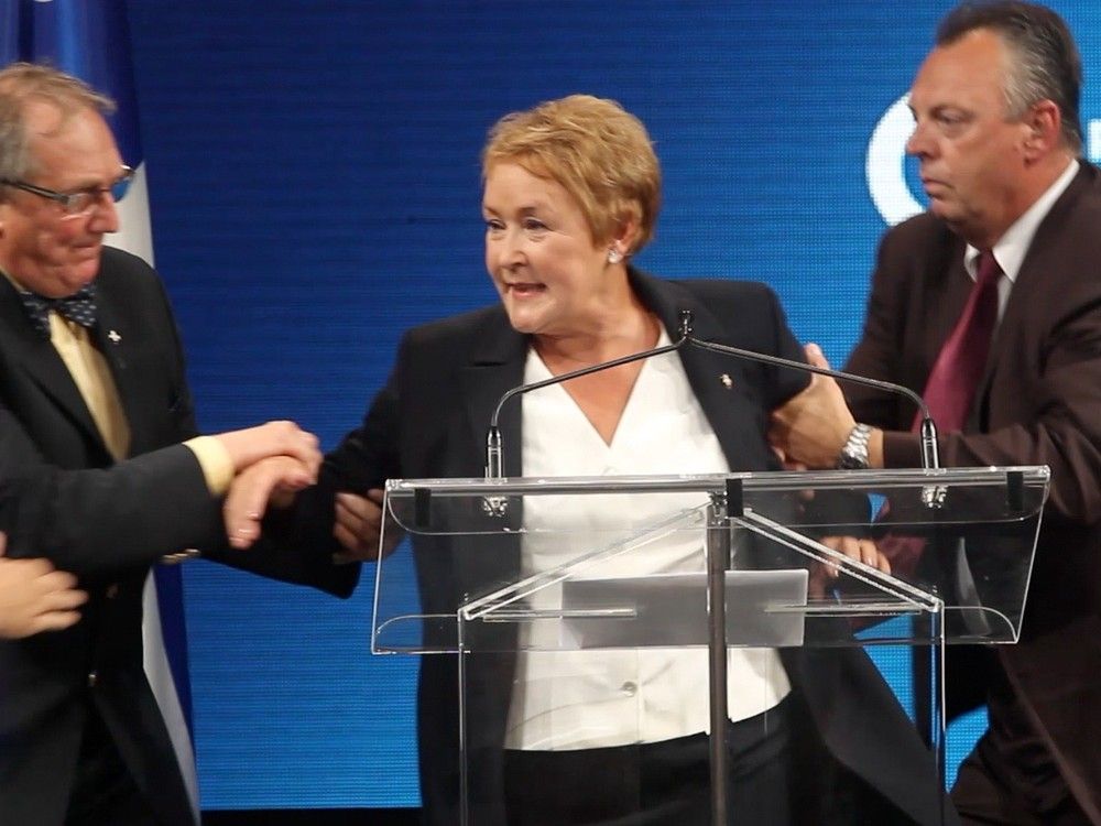 Photographic Memory: Video still shows Marois rushed off stage ...
