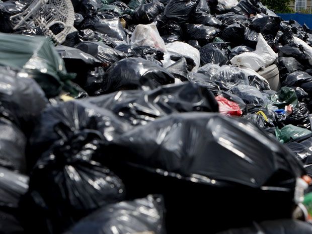 Couple found buried alive under garbage piles | National Post