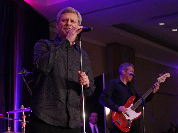 Harper sings a few songs for his party faithful | National Post