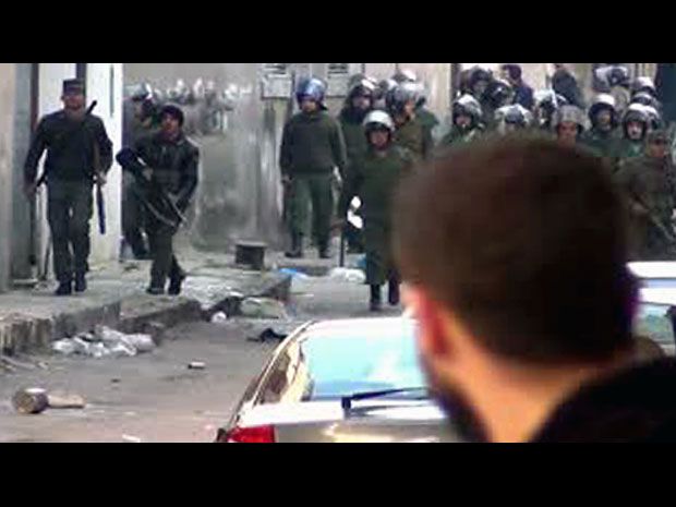 Syria: Snipers, still a threat as military hovers on outskirts of ...