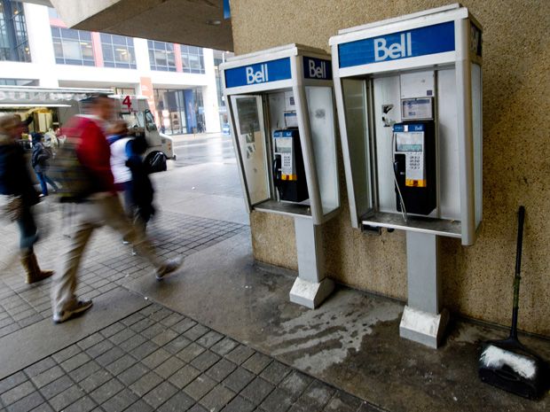 Quarters in a time of texting: A day in the life of a pay phone in ...