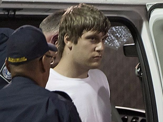 Travis Baumgartner pleads guilty to killing three colleagues in ...