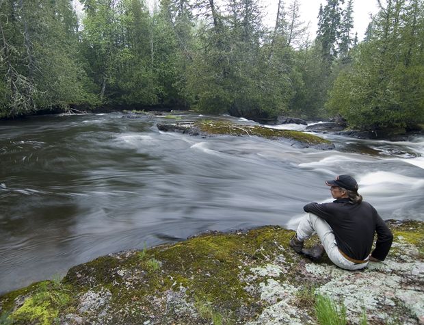 Father and son on the Oba river | National Post