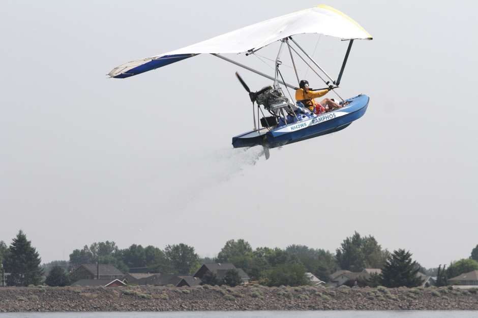 Is it a bird? Is it a plane? No, it's just some guy in a flying dinghy ...