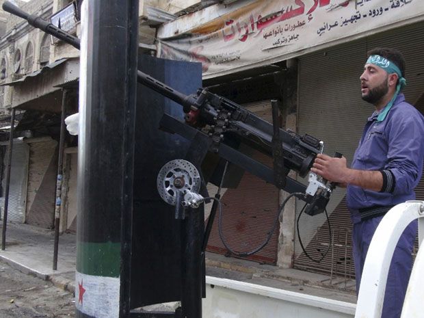 Syrian rebel fighters capture air defense base near Maarat al-Nuaman ...