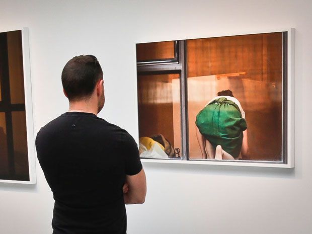 New York apartment dwellers furious over artist's photos taken through ...