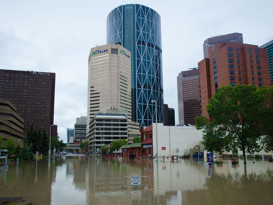 Two confirmed dead, one missing; Saddledome under water as hundreds of ...