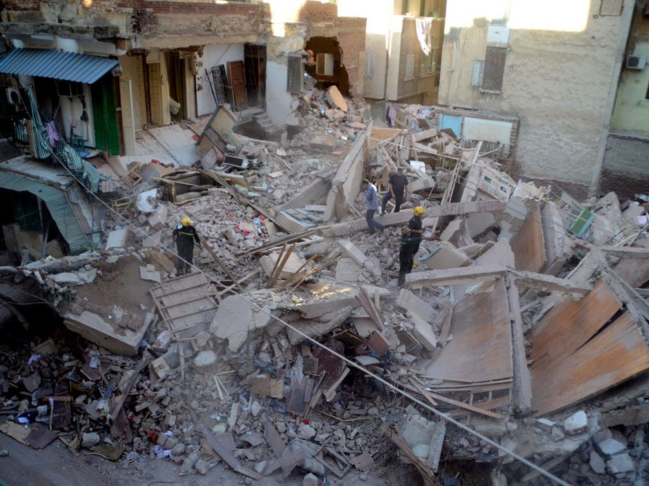 Residents trapped after seven-story building collapses on top of them ...