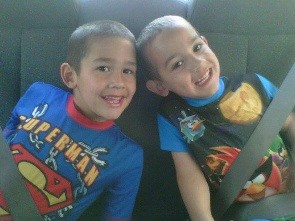 Snake owner arrested 18 months after python killed two young brothers ...