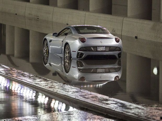 Lawyer who famously abandoned $200K Ferrari in Toronto flood gets 'very ...
