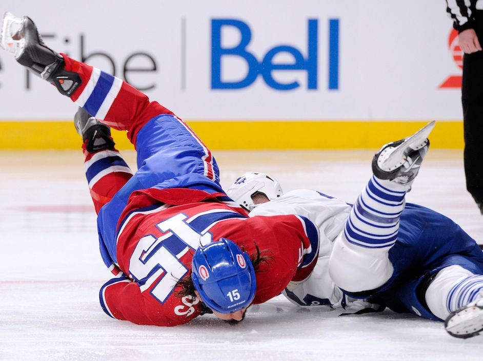 Canadiens' George Parros knocked out from fall during fight with Maple ...