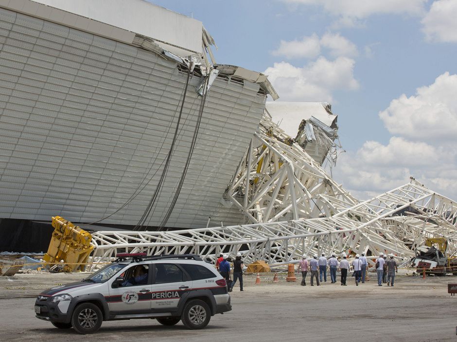 Video show the moment a crane rips a hole in a World Cup stadium ...